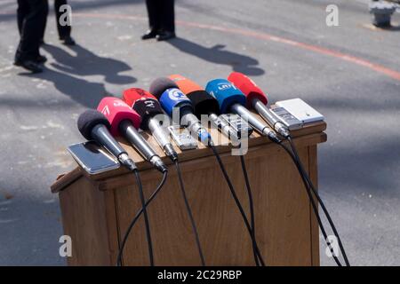 Detail with many microphones in a press conference room Stock Photo - Alamy