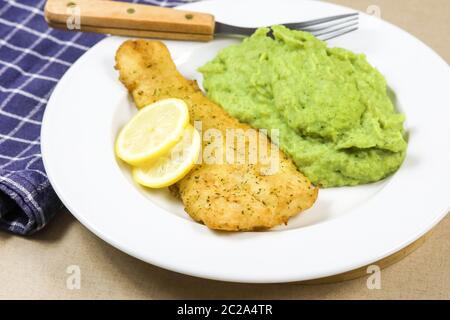 meunière fish fillet and green vegetable purée Stock Photo - Alamy