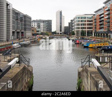 The leeds lock entrance to clarence dock with footbridge over the river ...