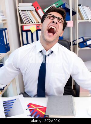 Angry boss throwing papers and yelling at the office. Boss getting mad ...