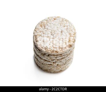 Pile of puffed rice crackers on white background Stock Photo - Alamy