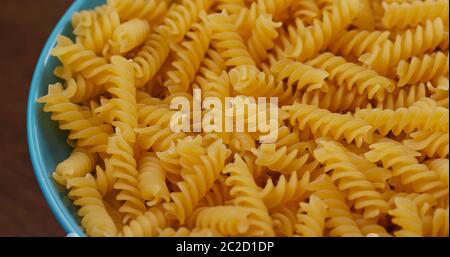 Stack of fusilli on plate Stock Photo - Alamy