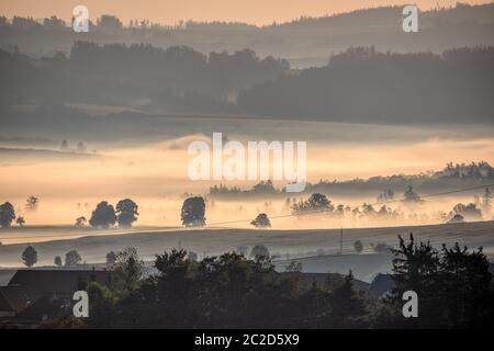 traditional fall landscape, Central europe. Foggy and misty sunrise ...