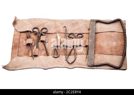 Medieval surgery doctors tools in leather wrap. Isolated Stock Photo ...