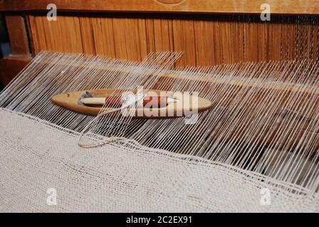 Shuttle on the antique loom and thread, Details handloom flax yarn ...