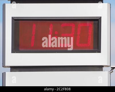 red led display showing time 11:30 (half past eleven Stock Photo - Alamy