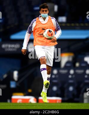 Manchester City's Rodri warms up ahead of the Premier League match at ...