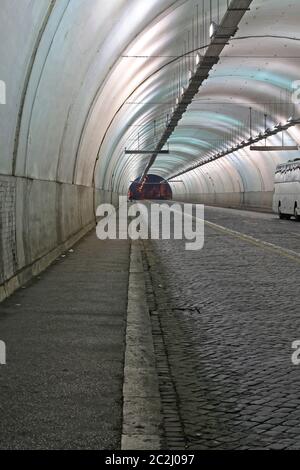 Tunnel With Two Lane Road and Sidewalk in Rome Stock Photo - Alamy
