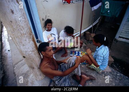 Los Charamicos Dominican Republic Mother With Two Children Stock Photo ...