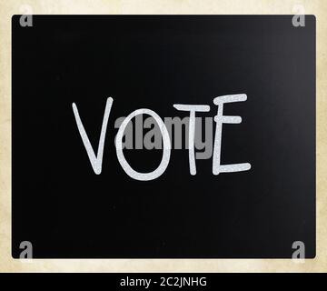 vote word handwritten on blackboard with heart symbol instead O Stock ...