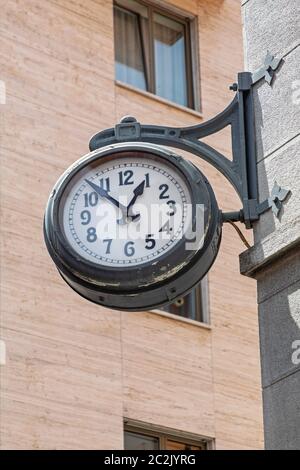 Analog Public Clock at Building Corner in Lugano Stock Photo - Alamy
