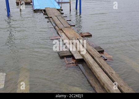 Floating Plank Boards Bridge Over Water Floods Stock Photo - Alamy