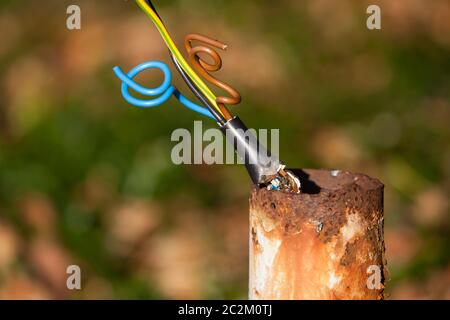 Old cable uninsulated Stock Photo - Alamy