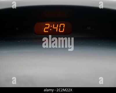 The clock inside the car. Place for text. Transport Stock Photo - Alamy