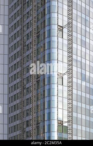 Scaffolding at glass skyscraper building during construction Stock ...