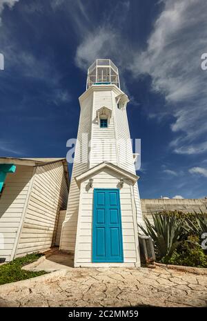 White and blue lighthouse: the lighthouse of Isla Mujeres in Mexico ...