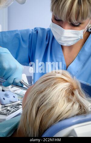 woman dentist pain torture forceps patient surgery painful doctor ...