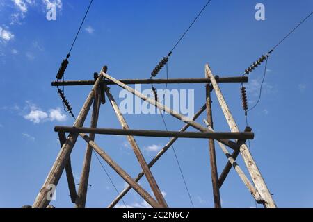 Wooden pillar of electricity transmission line Stock Photo - Alamy