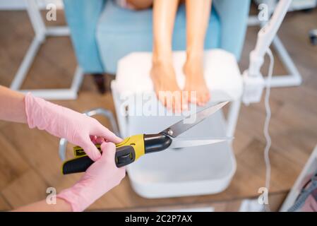 Cosmetologist salon, clipping procedure, humor Stock Photo - Alamy