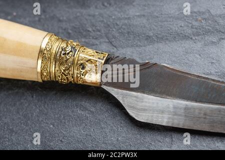 Details of a traditional handmade balinese knife belakas shot on a ...