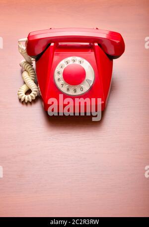 Fashion red retro telephone, front view Stock Photo - Alamy