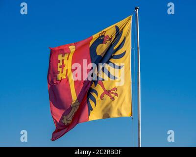 Geneva flag waves proudly against a clear blue sky in Switzerland Stock ...