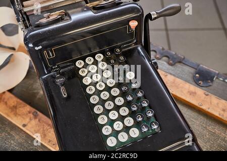 ANTIQUE MANUAL CASH REGISTER ON COUNTER IN OLD GENERAL MERCHANDISE ...