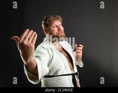 Fat bearded karate fighter in white kimono in the open air Stock Photo ...
