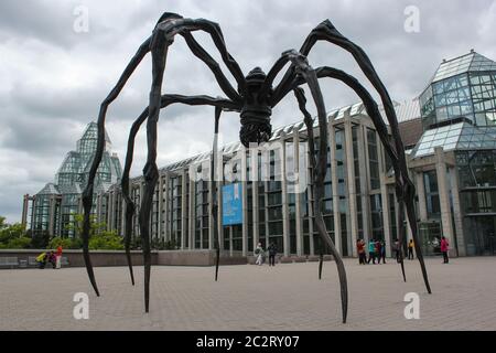 Spider statue in front of the national gallery and the notre dame ...