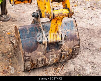 Iron bucket of a construction excavator. Technics Stock Photo - Alamy