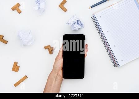 Puzzle, pencil, notebook, mobile and crumpled paper Stock Photo - Alamy