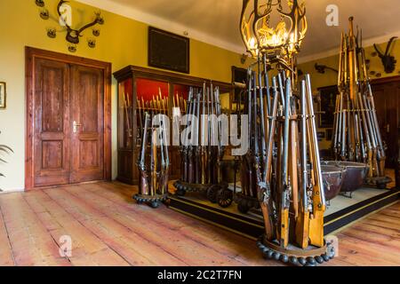 Room with old weapons, ancient armory storage, Europe. Medieval ...
