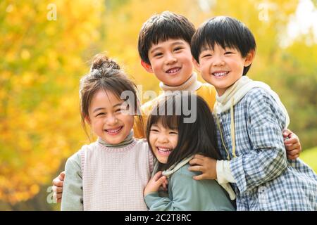 Laugh a lot of boys and girls Stock Photo - Alamy