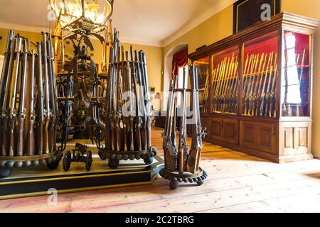 Room with old weapons, ancient armory storage, Europe. Medieval ...