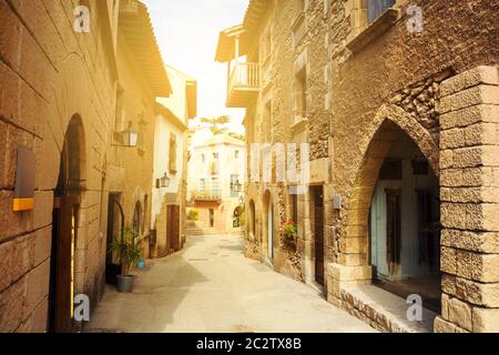 Spanish suburban street at sunset Stock Photo - Alamy