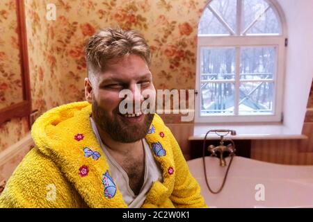 Crazy cheerful overweight dressed in funny pajamas with leopard print ...