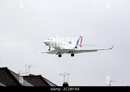 A plane carrying French president Emmanuel Macron lands at RAF Northolt ...