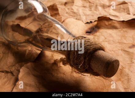 ancient scroll message in the bottle on white background with path ...