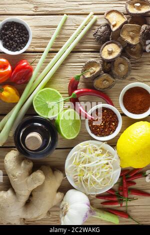 Asian food background with various ingredients on a black background ...