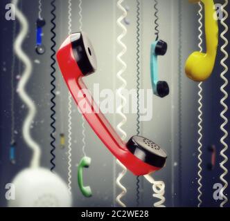 Lots of hanging retro telephone handsets Stock Photo - Alamy