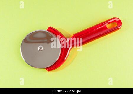 Picture of Plastic Red Pizza Cutter Slicer Knife Stock Photo - Alamy