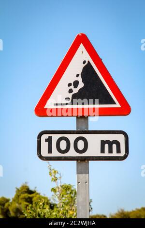 a road sign loose rock, attention scree Stock Photo - Alamy