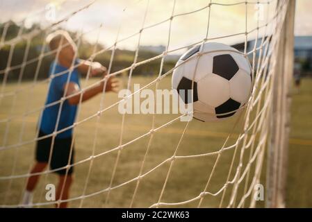 Male soccer goalkeeper missed the ball Stock Photo - Alamy
