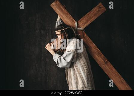 The great martyr with cross, black background. Crucifixion of Jesus ...