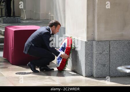 President Emmanuel Macron lays a wreath at statue of Georges Clemenceau ...