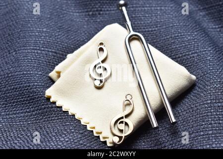 Tuning fork and a clef Stock Photo - Alamy