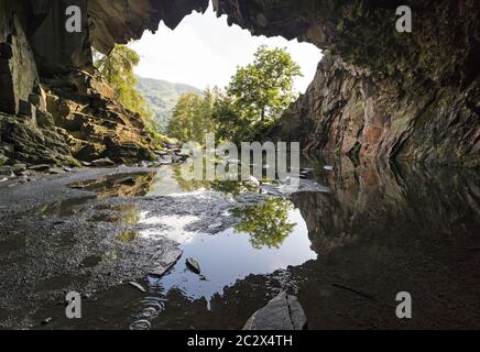 View from Rydal Cave, an old disused slate mine near Ambleside, in the ...