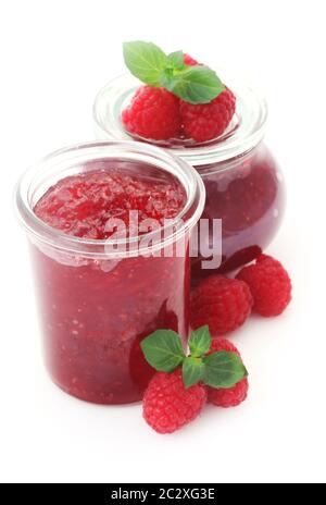 Jars of raspberry jam and raspberries Stock Photo - Alamy