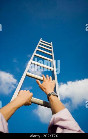 Businessman in career progression concept with crane Stock Photo - Alamy