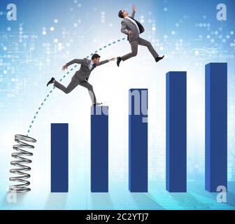 Business people jumping over bar charts Stock Photo - Alamy
